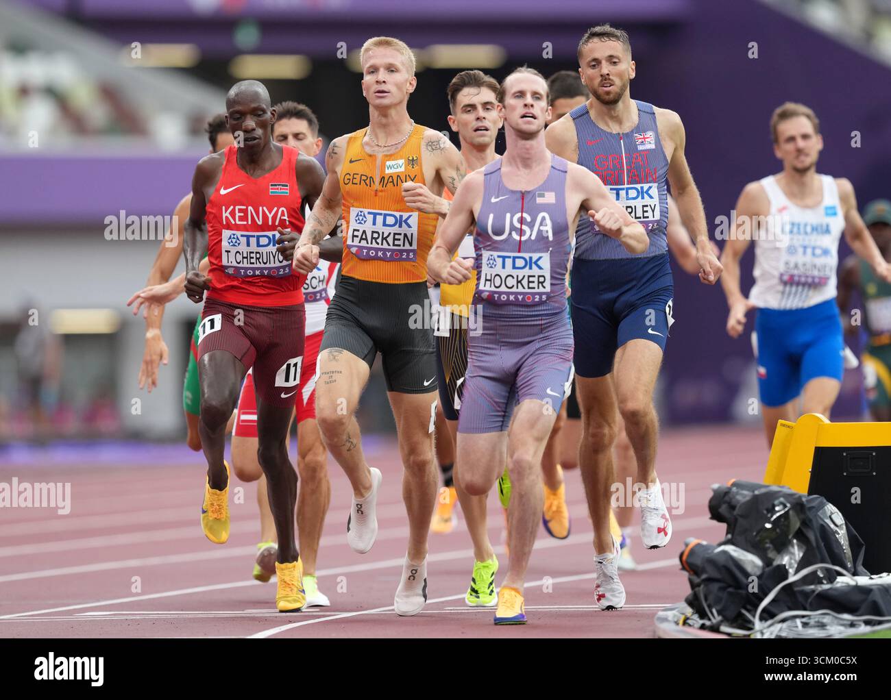 Great Britain's Neil Gourley (right) crosses the line to finish third ...