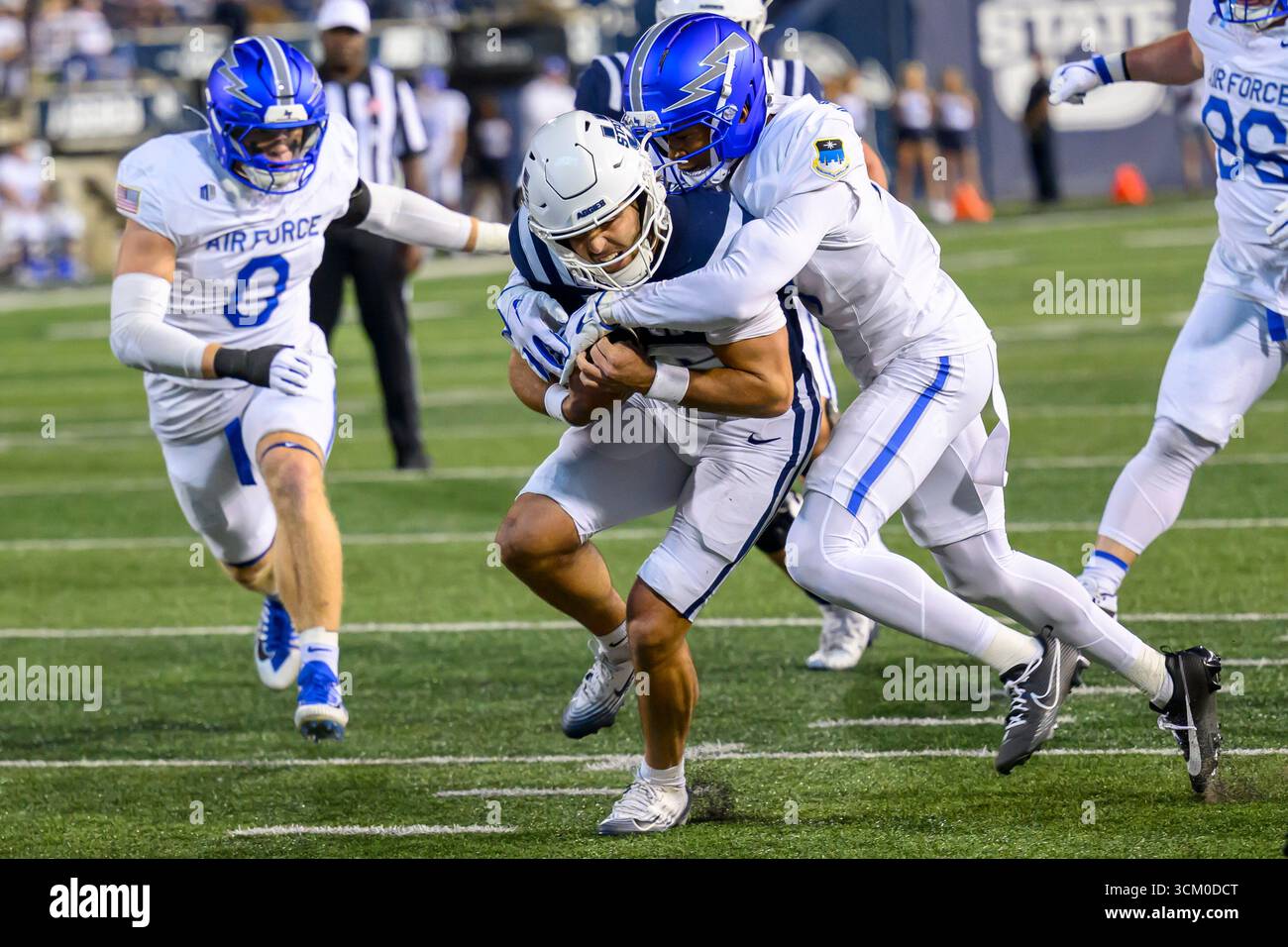 Utah State quarterback Bryson Barnes (16) runs in for a touchdown as he ...