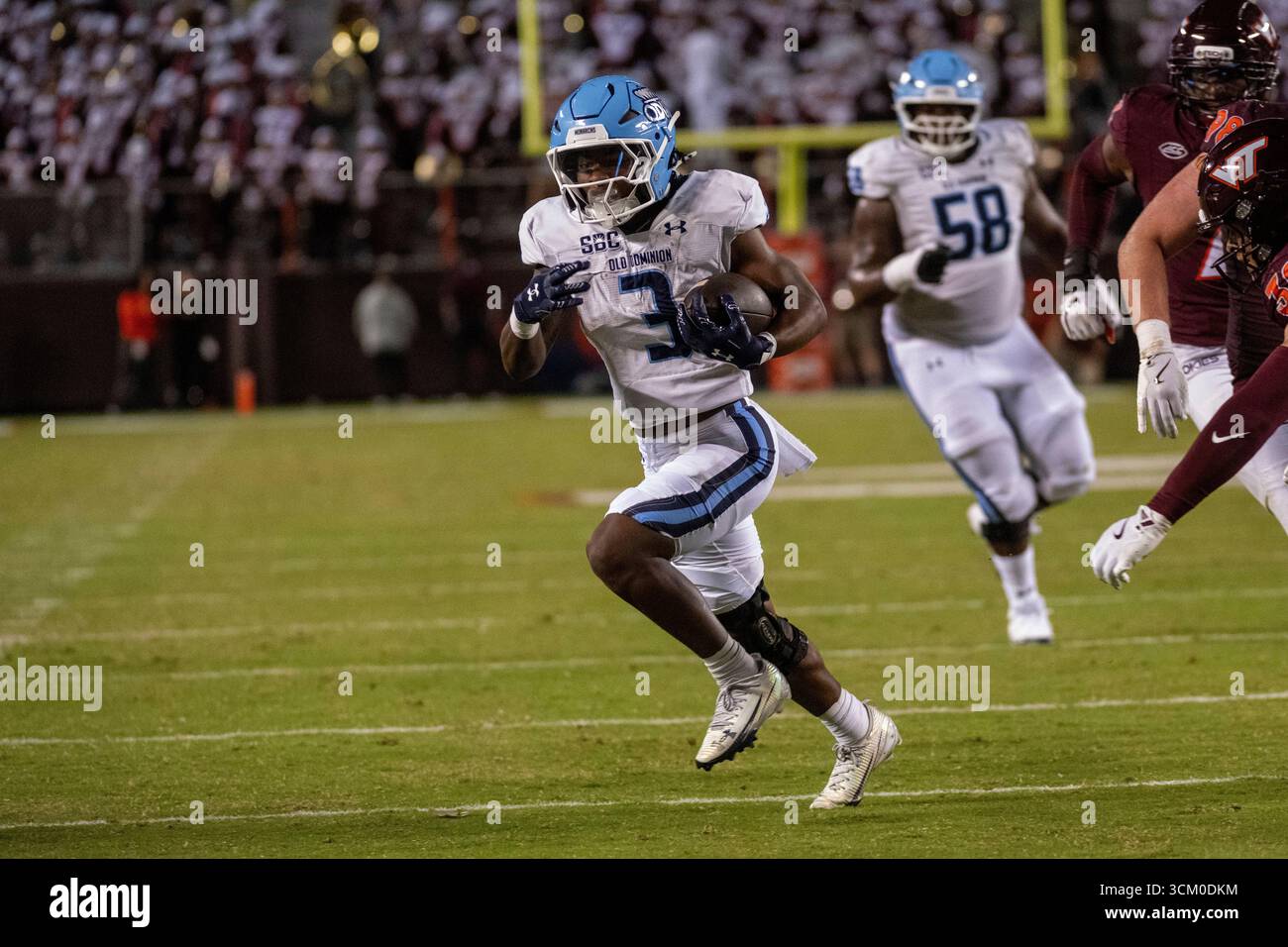 Old Dominion running back Devin Roche (3) runs for a touchdown against ...