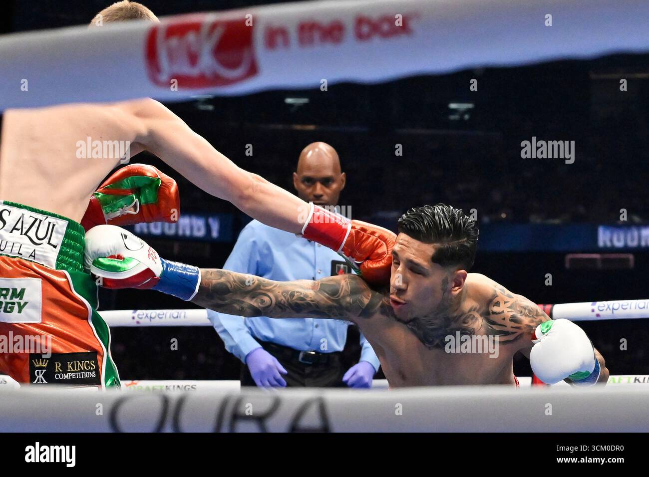 Fernando Vargas Jr., right, punches Callum Walsh during a super welterweight boxing match h in ...