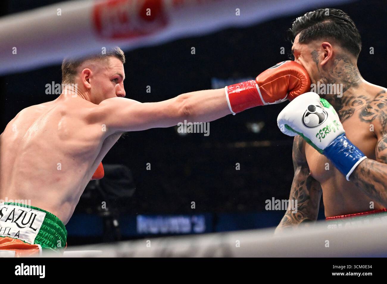 Callum Walsh, left, punches Fernando Vargas Jr. during a super ...
