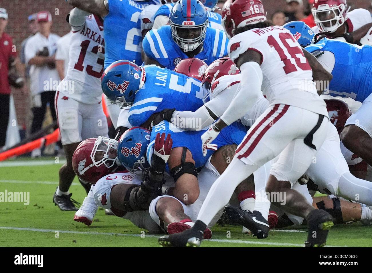 Mississippi running back Kewan Lacy (5) fights for extra yards against ...