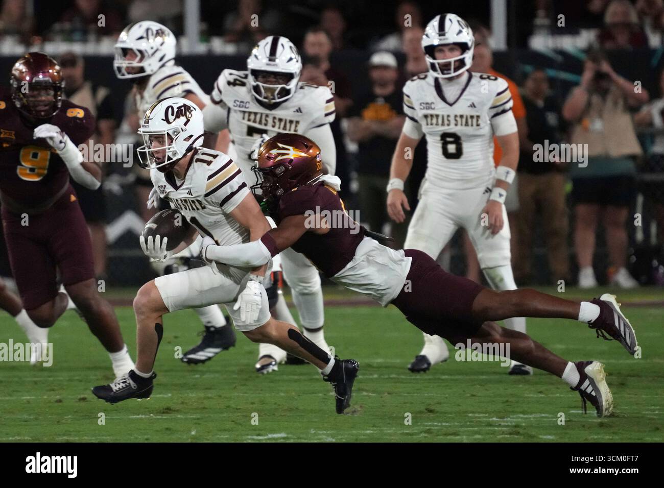 Arizona State defensive back Keith Abney II (1) tackles Texas State ...