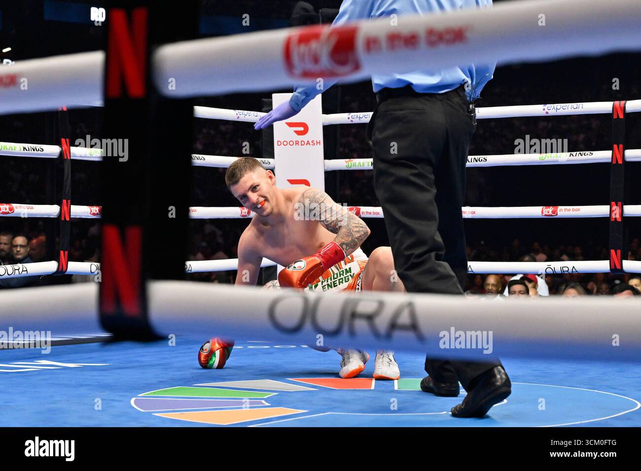Callum Walsh reacts as he gets up from the mat, though he was not ...