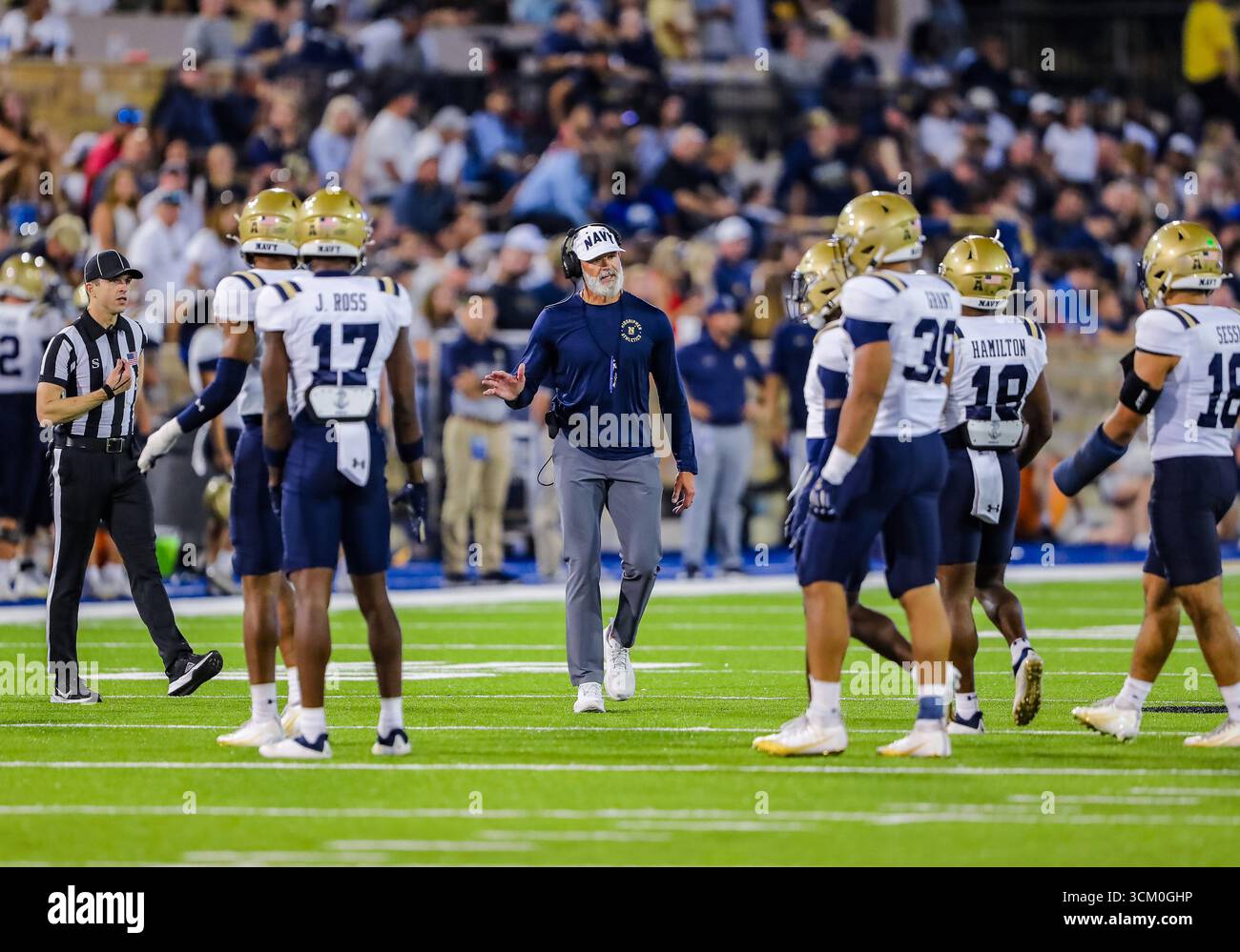 September 13, 2025:.Navy Midshipmen head coach Brian Newberry calms his ...