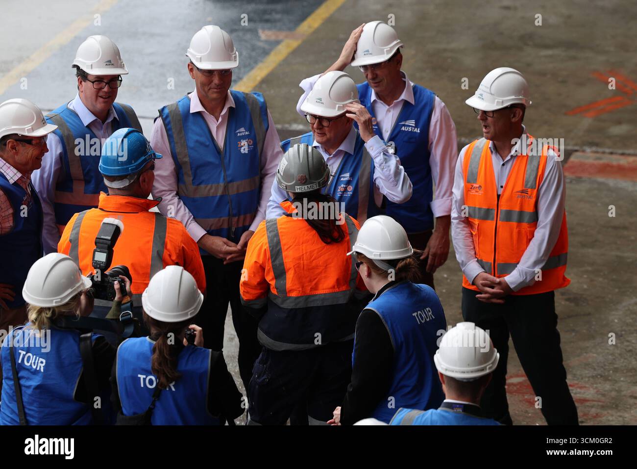 The Prime Minister, Anthony Albanese, Centre, holding hat) is in ...