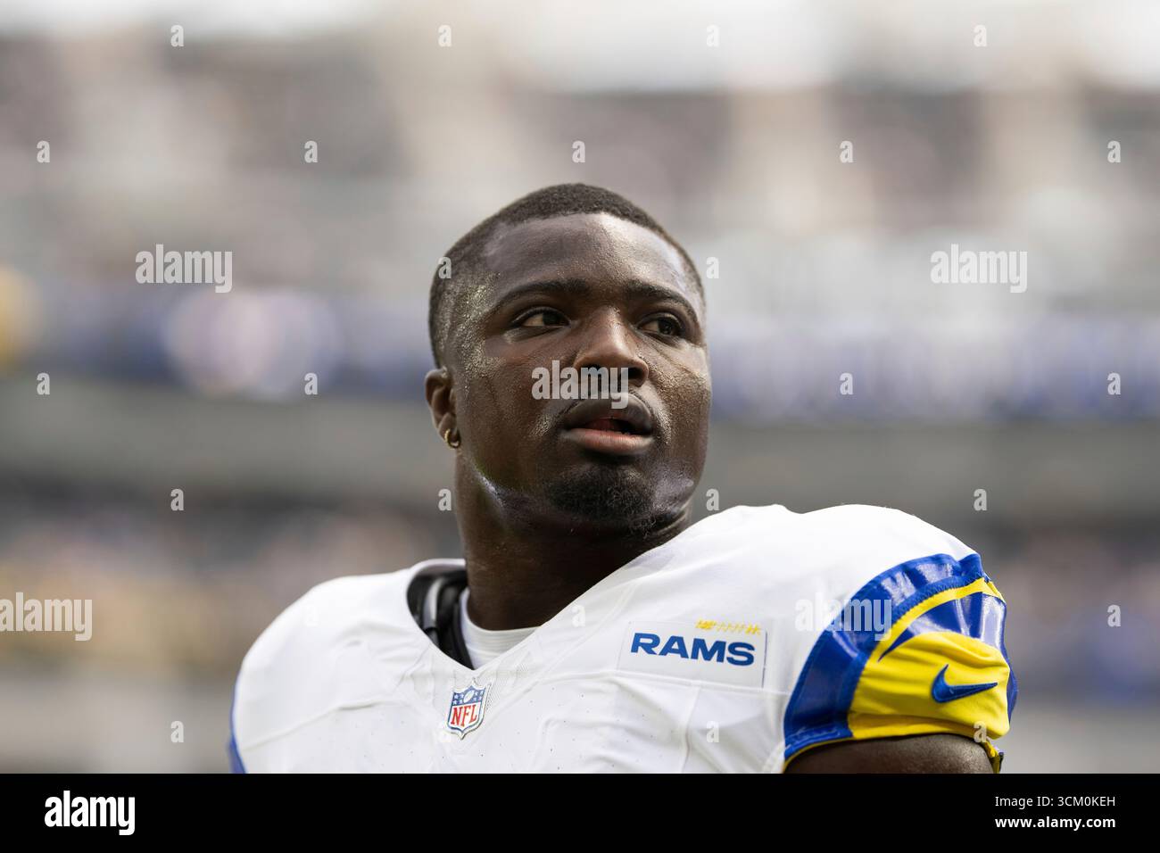 Los Angeles Rams linebacker Byron Young (0) walks on the field before ...