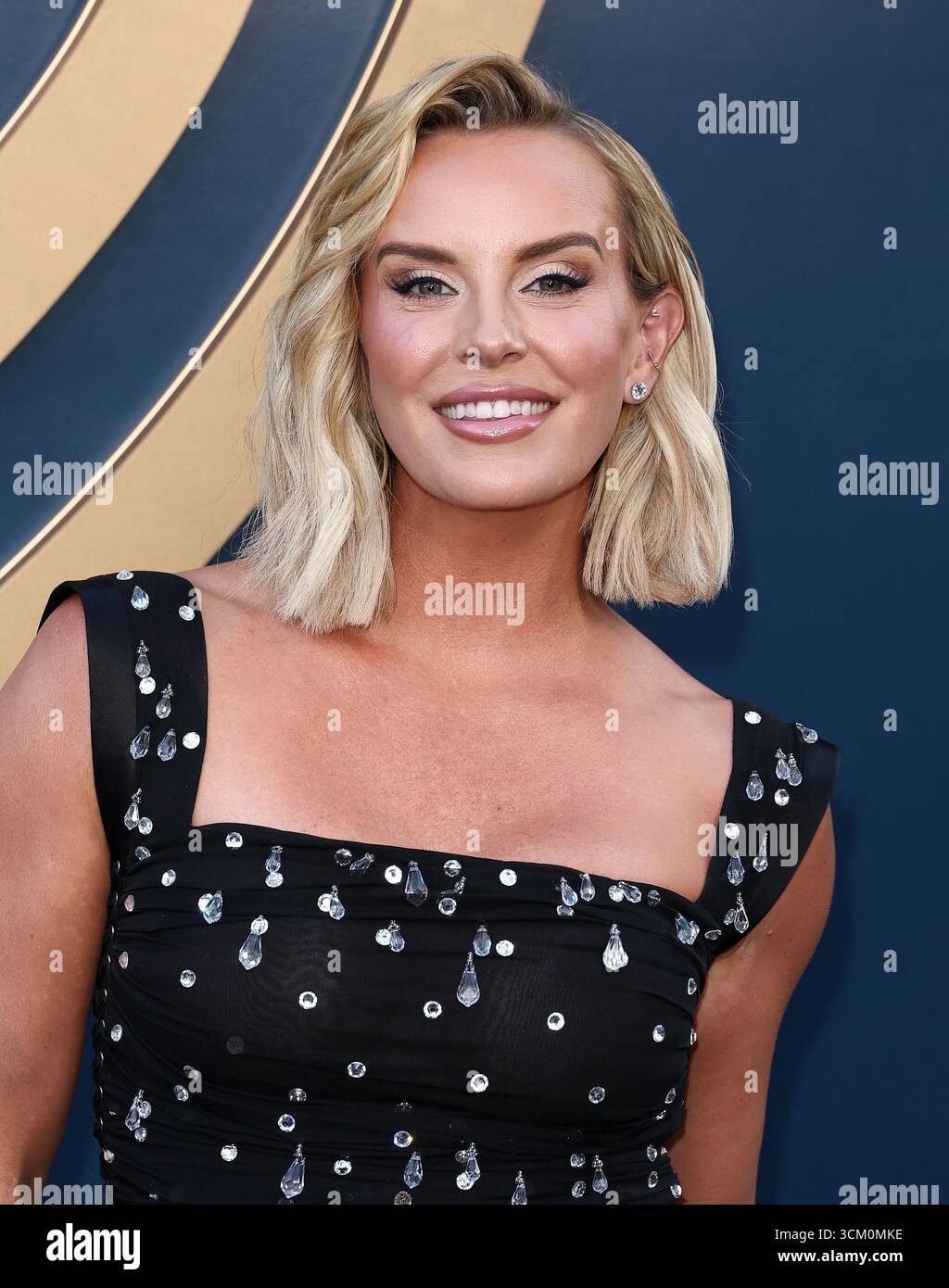 Whitney Rose arrives at Warner Bros Television Group's 77th Primetime ...