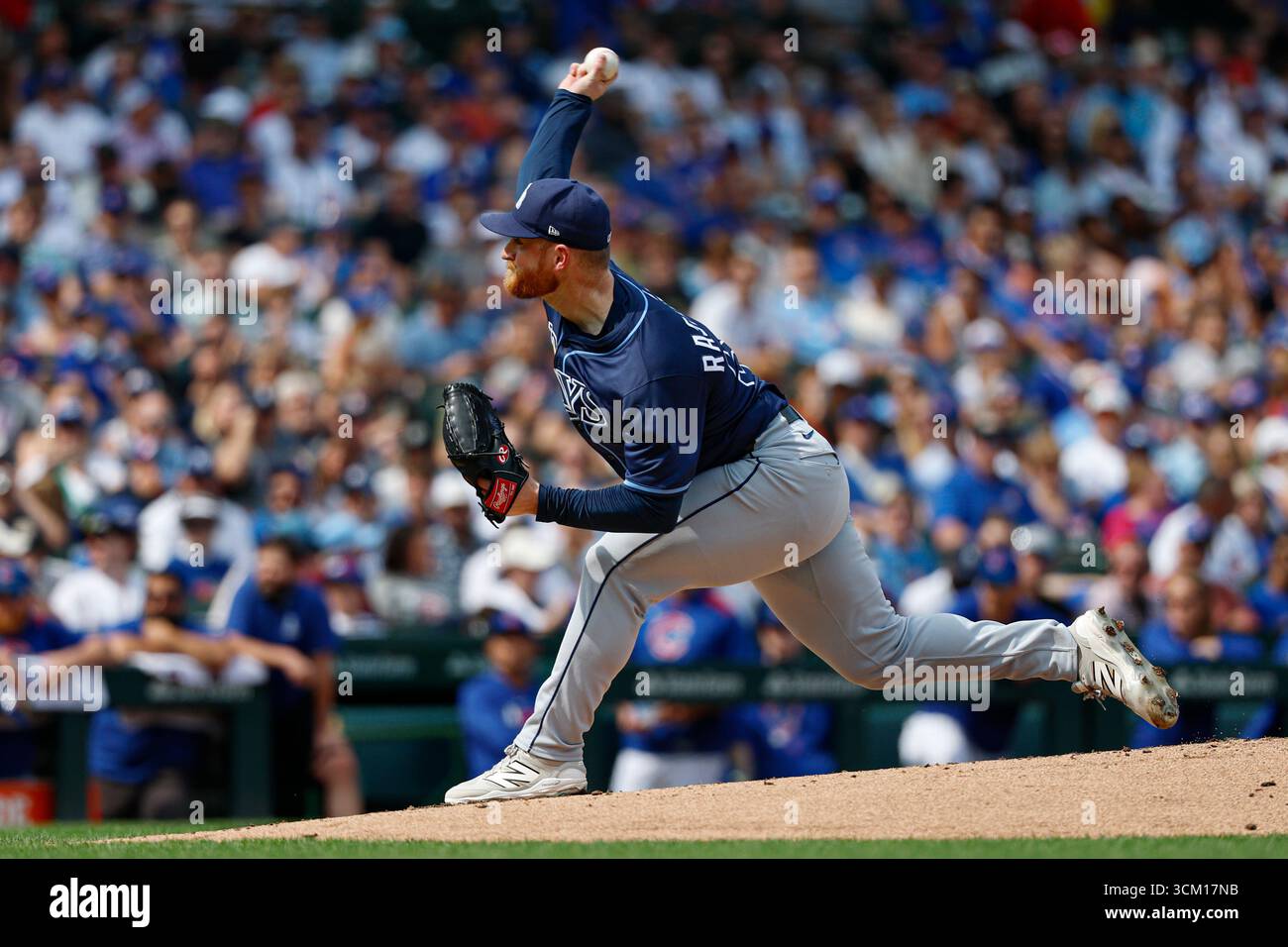 Tampa Bay Rays starting pitcher Drew Rasmussen (57) delivers a pitch ...