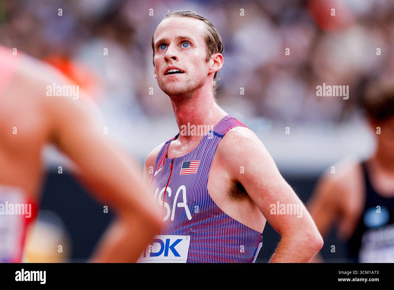 Cole Hocker of United States of America looks on after competing in the ...