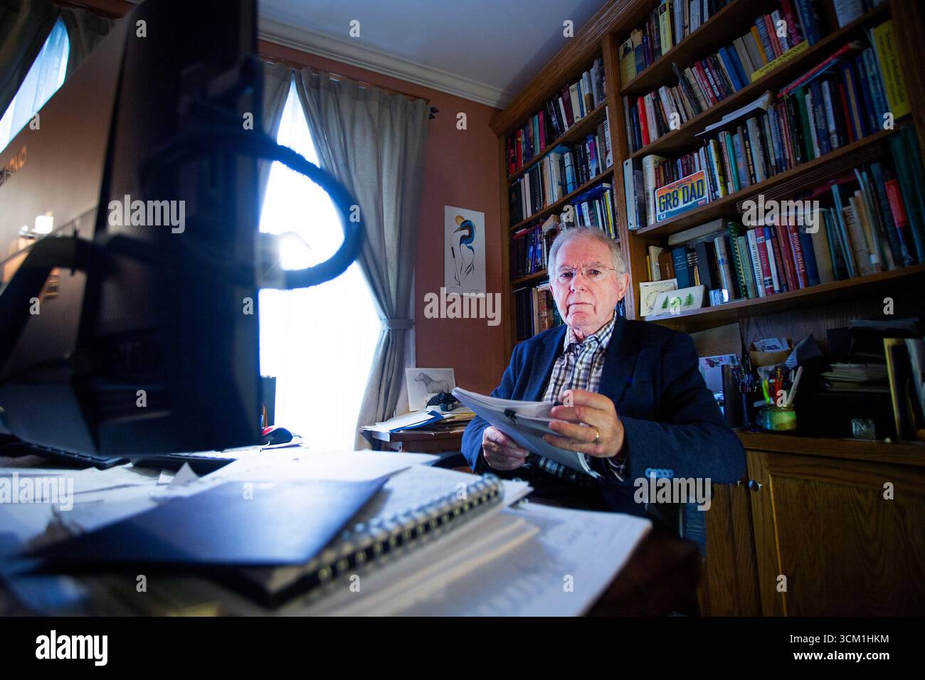Jack Harris, a former member of Parliament for the NDP, reads the ...