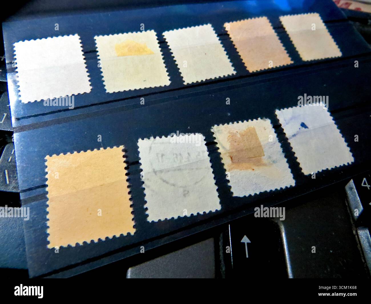 Displayed are various postage stamps revealing unique designs and ...