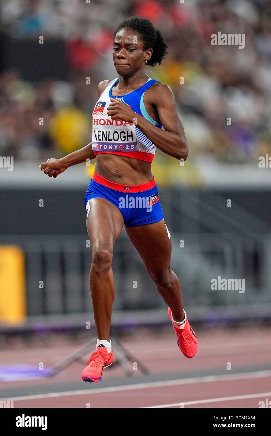 Haiti's Wadeline Venlogh races in a women's 400 meters heat at the ...