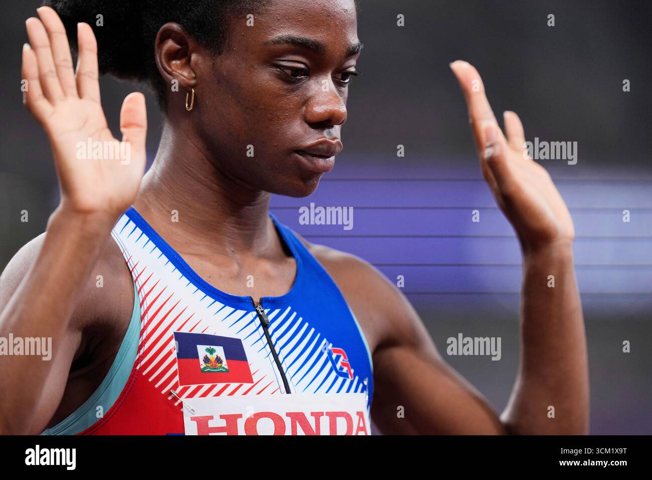 Haiti's Wadeline Venlogh prepares to compete in the women's 400 meters ...