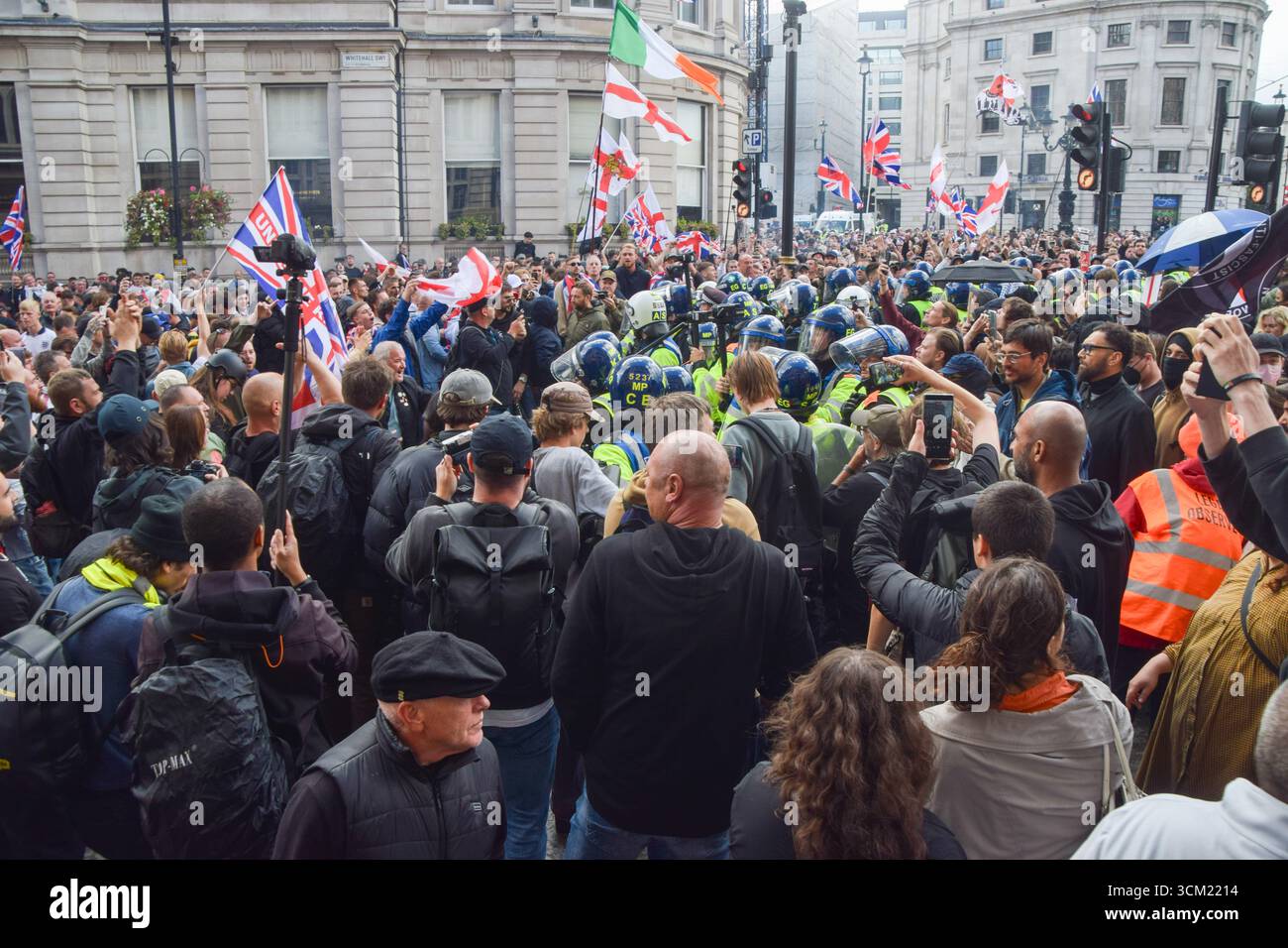 London, UK. 13th September 2025. Riot police keep far-right protesters ...