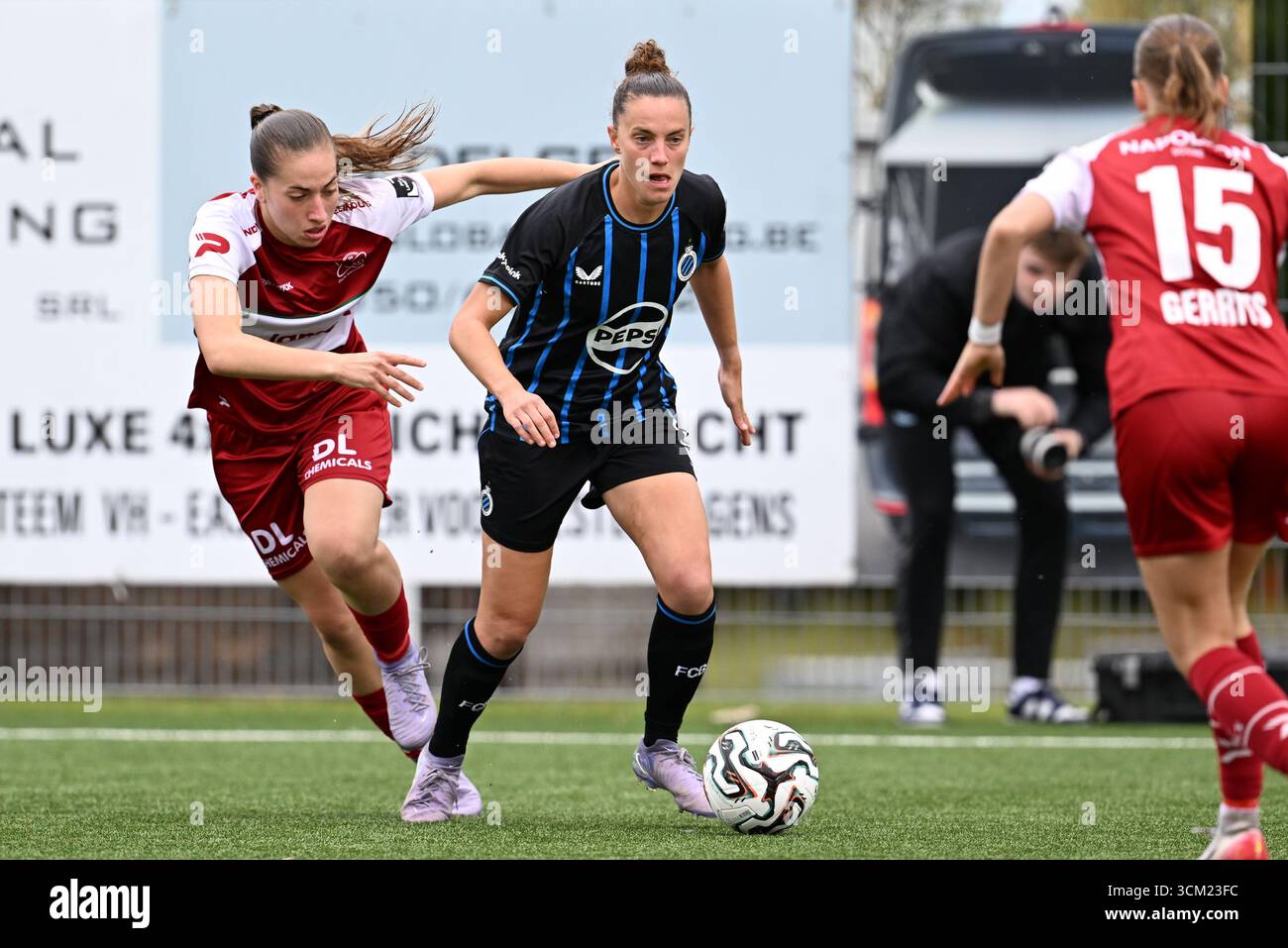 Lena Hubaut (6) of Zulte-Waregem and Chloe Vande Velde (8) of Brugge ...