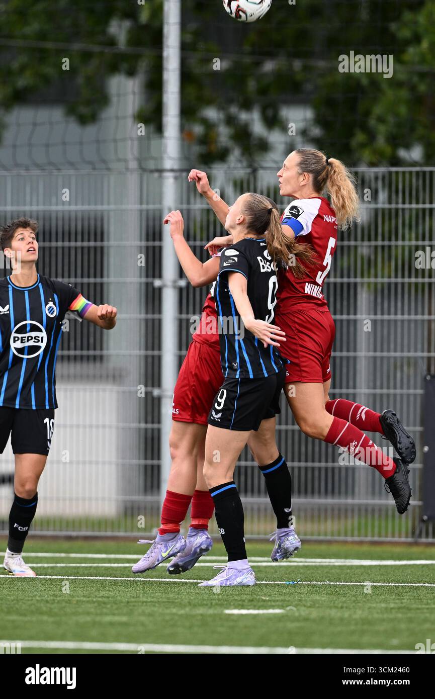 Lisa Petry (9) of Brugge pictured fighting for the ball with Pauline ...