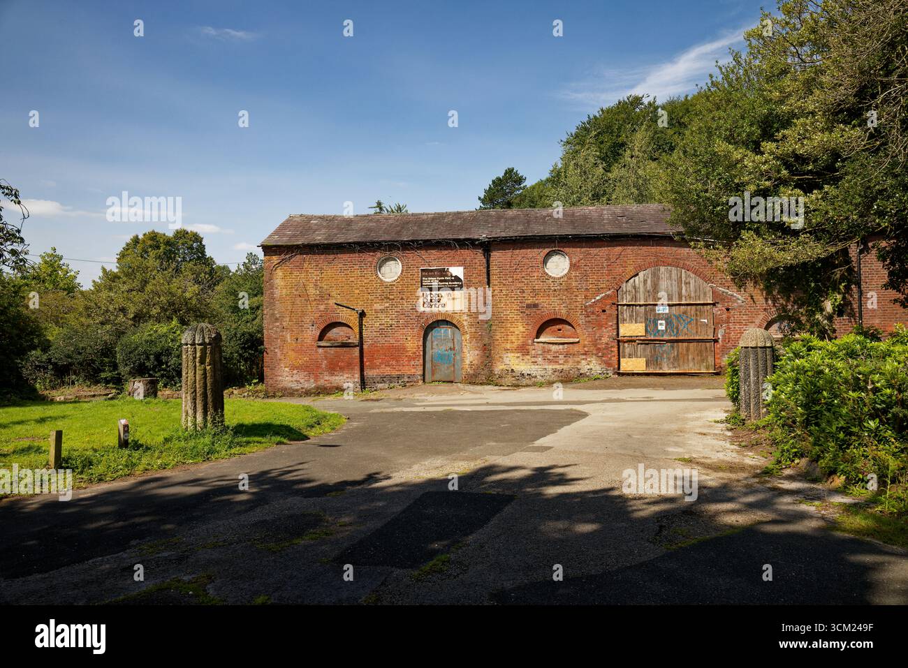 The near derelict stables and estate buildings of the demolished ...