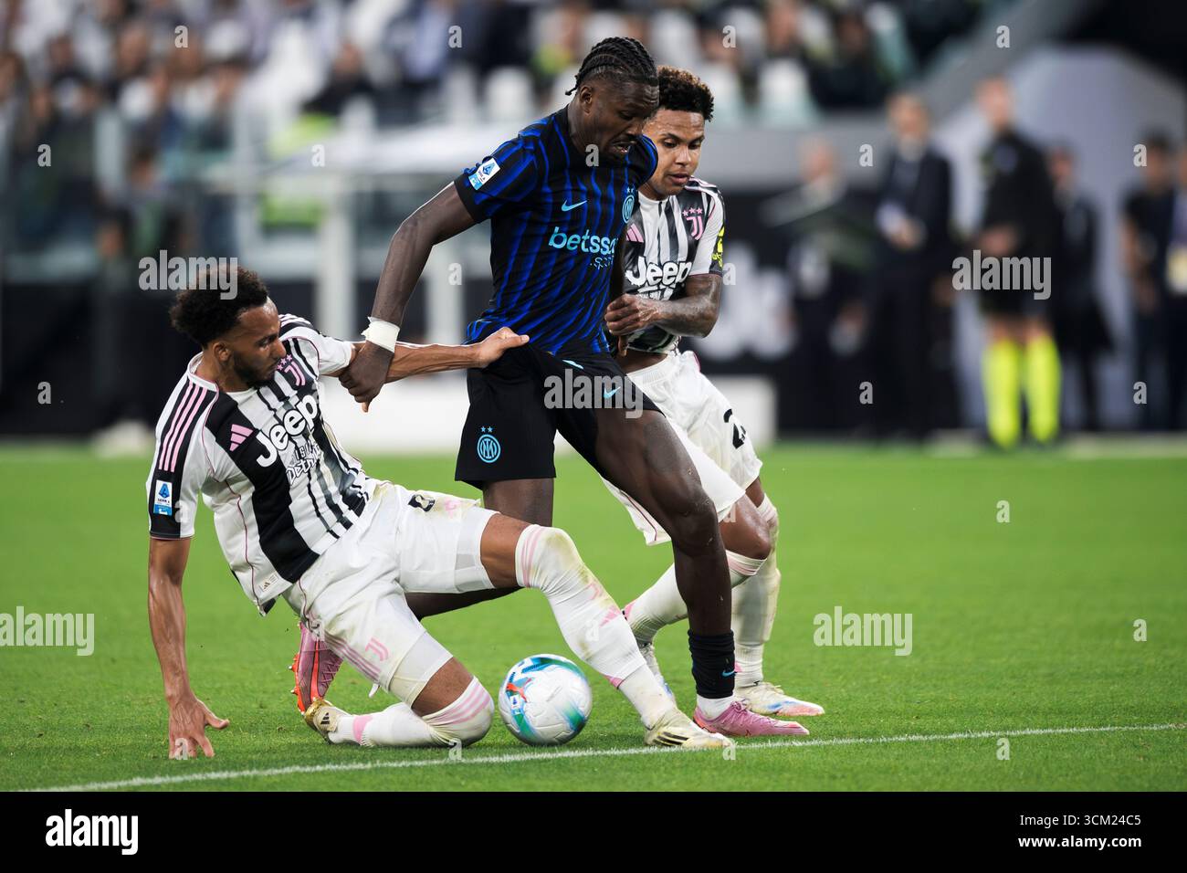 Marcus Thuram of FC Internazionale competes for the ball with Lloyd ...