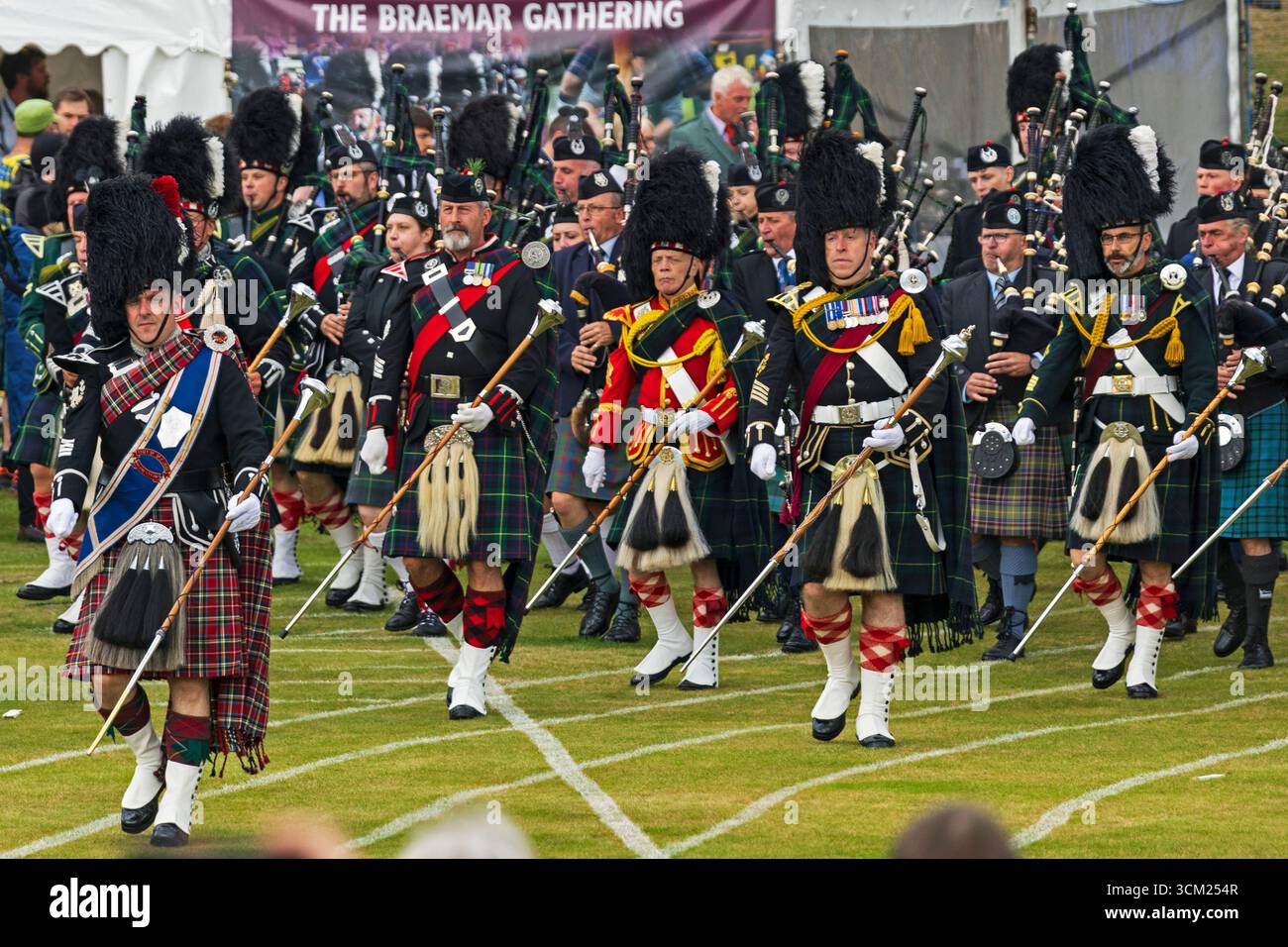 Braemar Gathering, massed pipe bands parade Stock Photo - Alamy