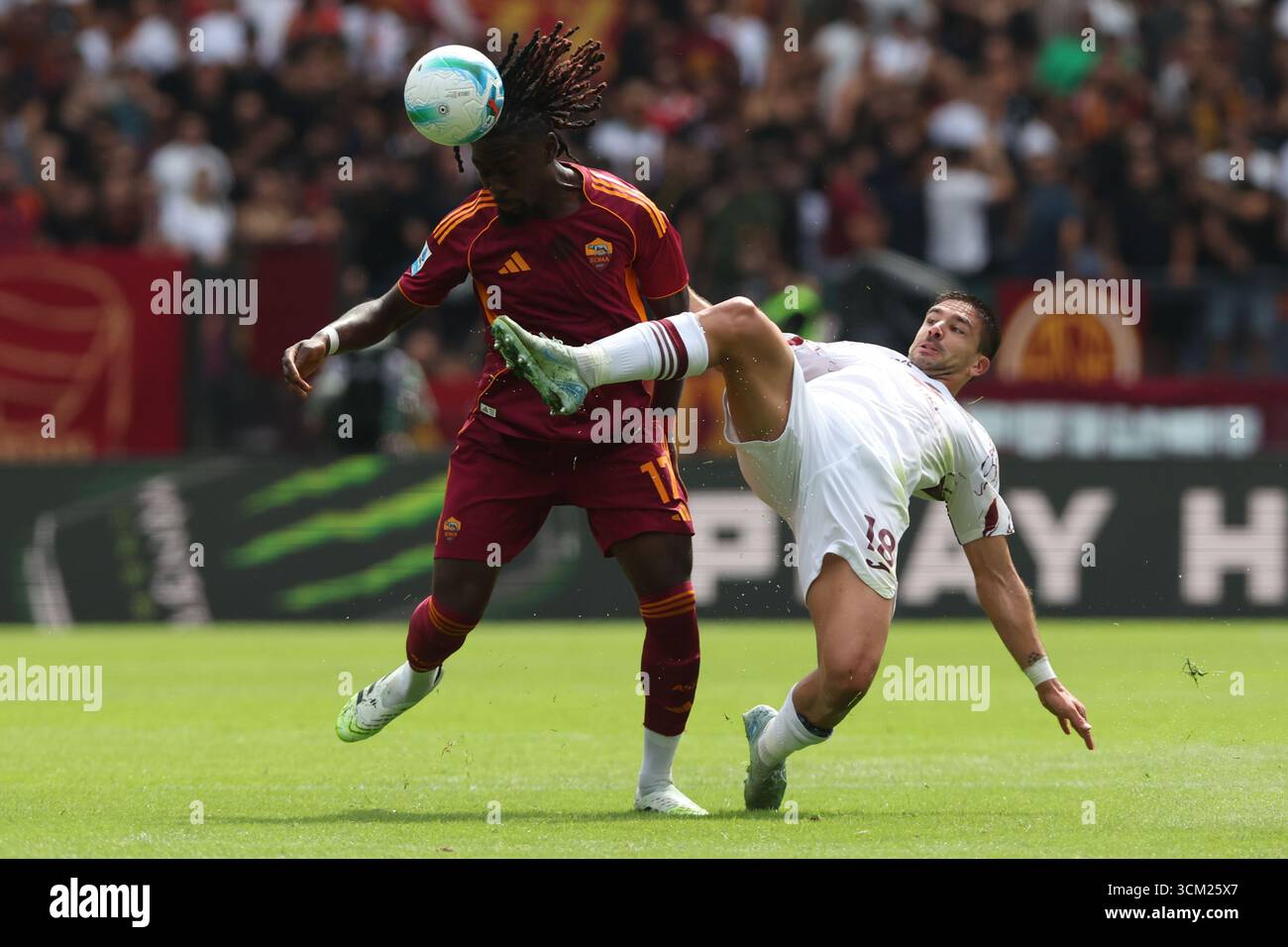 Rome, Italy - September 14, 2025: Manu Kone of Roma, Giovanni Simeone ...