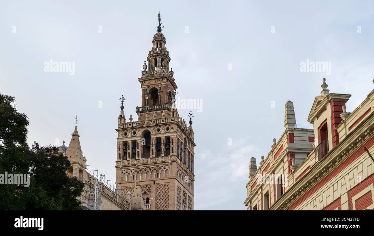 The breathtaking tower of the huge cathedral in Seville, Andalusia ...