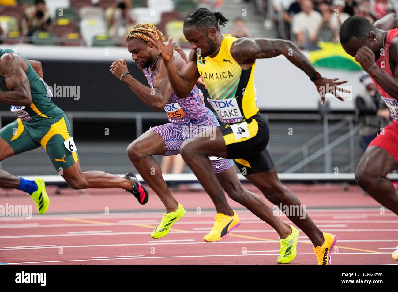 United States' Noah Lyles and Jamaica's Ackeem Blake compete in a men's ...