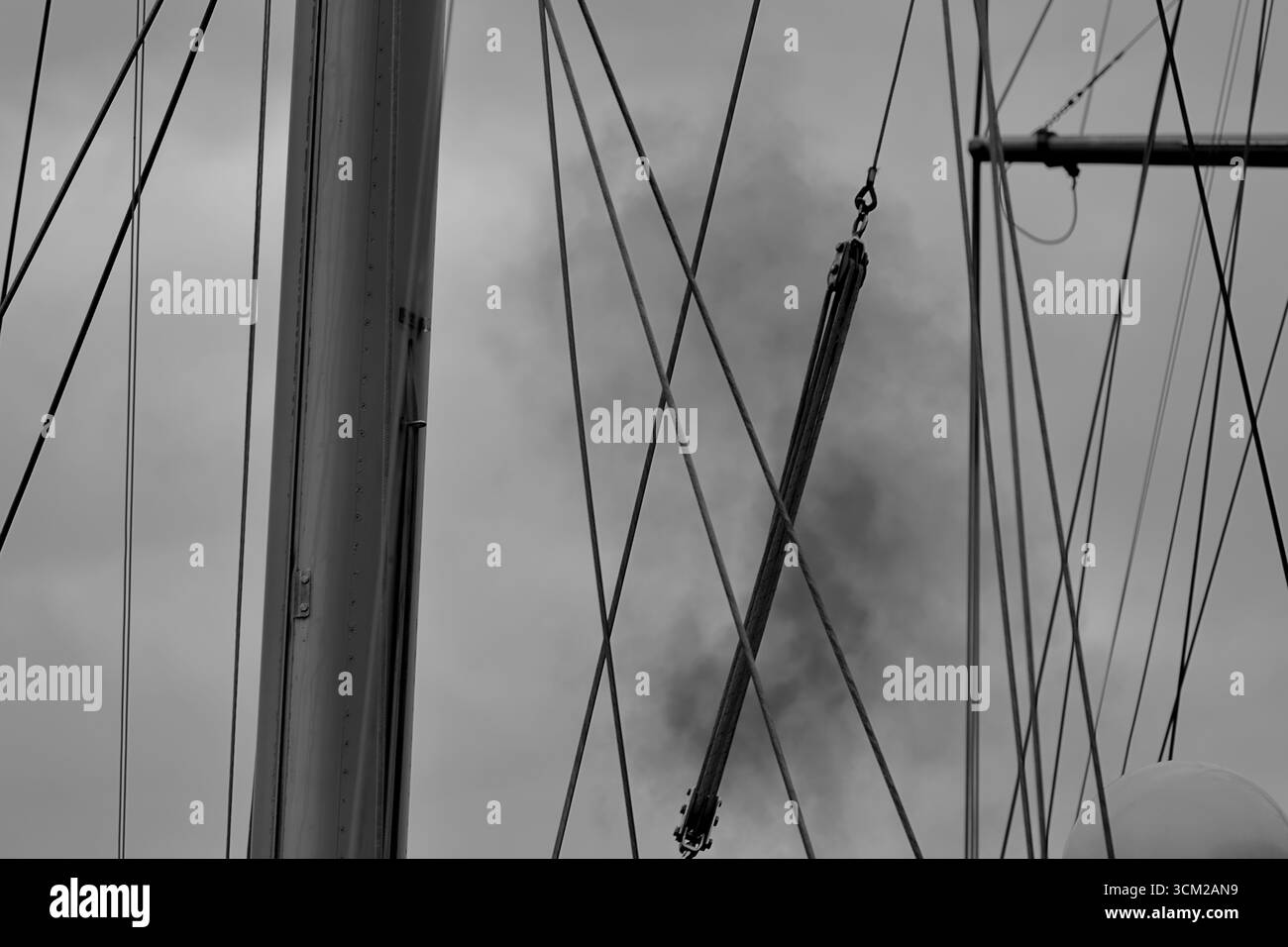 Monochrome view of masts and standing rigging on a sailing vessel at ...