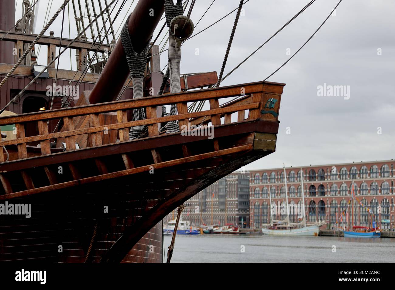 Wooden bowsprit and forecastle of a historic sailing ship moored at ...