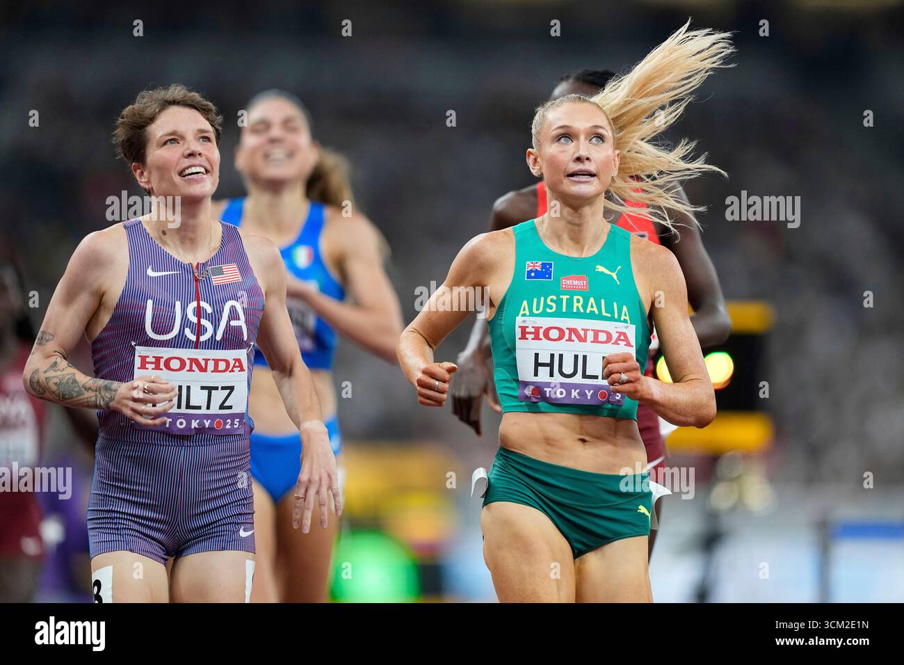 United States' Nikki Hiltz and Australia's Jessica Hull finish a women ...
