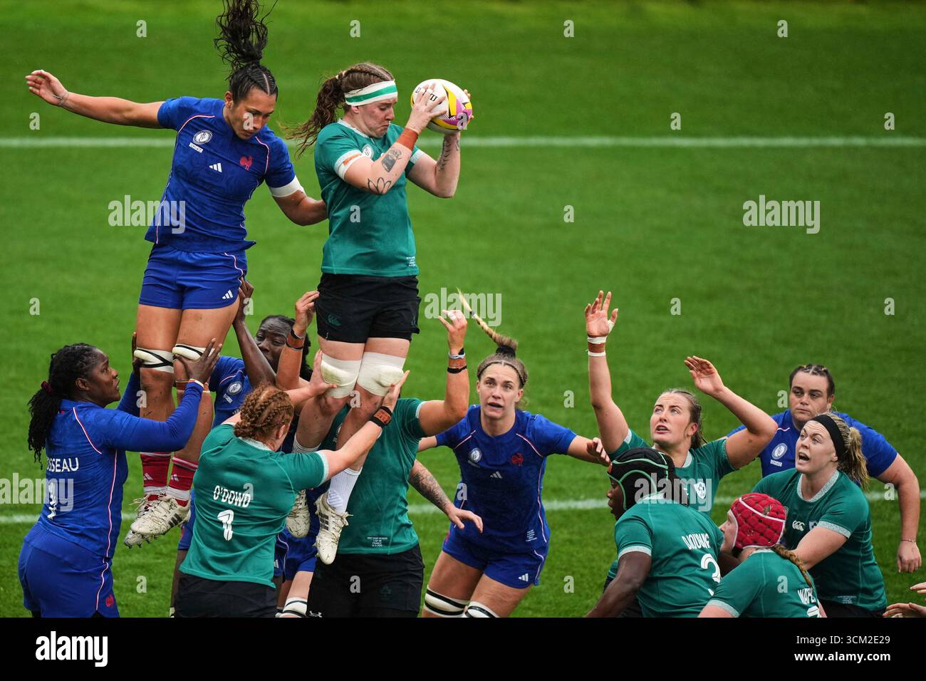 Ireland's Ruth Campbell, top right wins a line out during a Women's ...