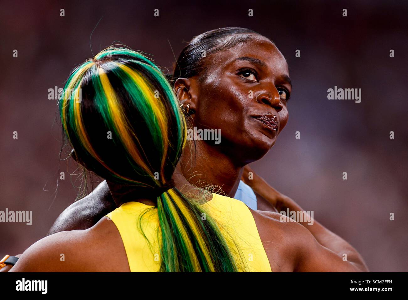 Julien Alfred of Saint Lucia and Shelly-Ann Fraser-Pryce looks on after ...
