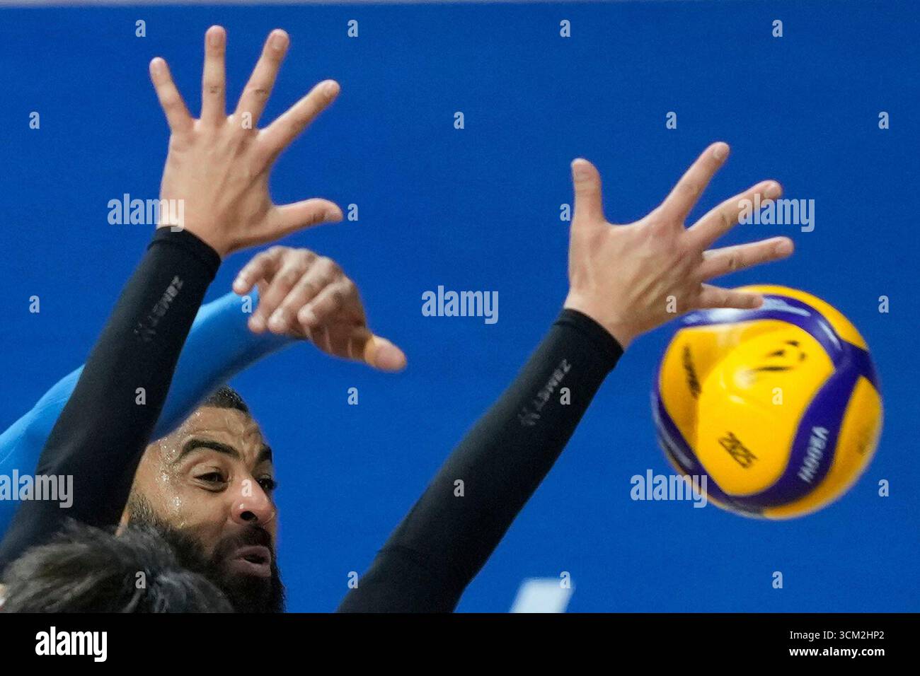 Earvin Ngapeth hits the ball during their pool phase match against ...