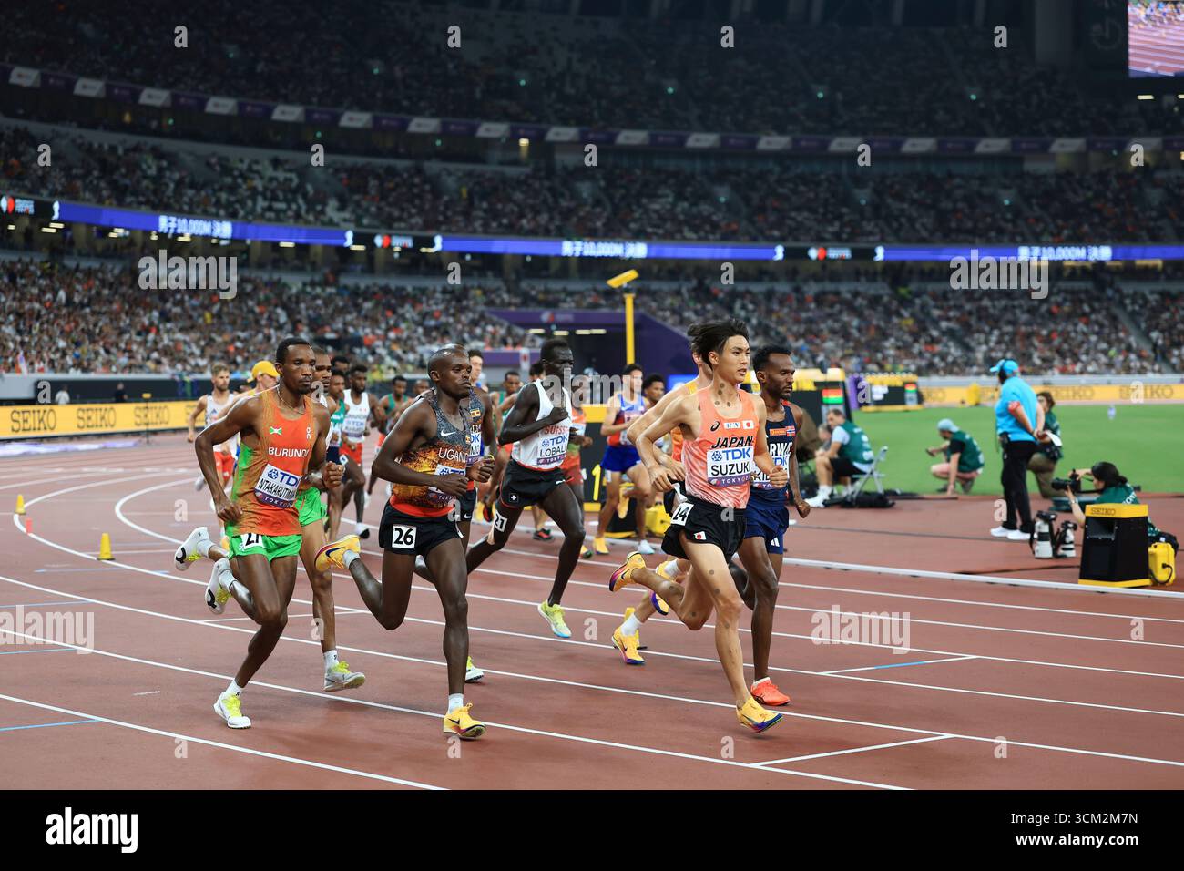 Athletes compete in the men's 10000 meters final at the World Athletics ...