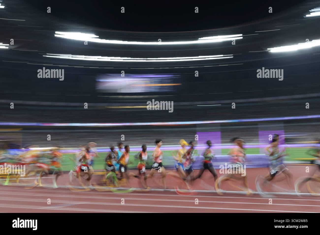 Athletes compete in the men's 10000 meters final at the World Athletics ...