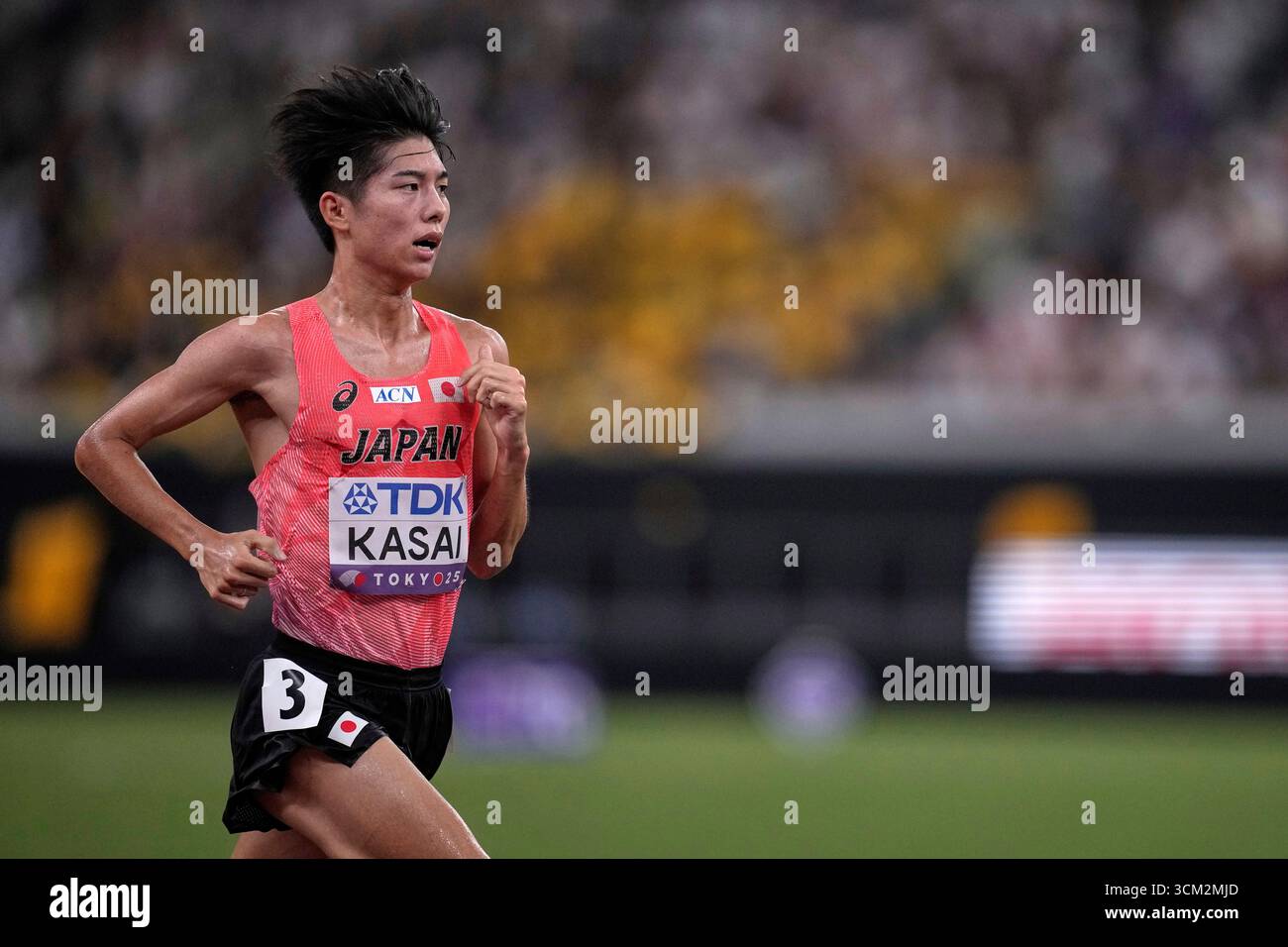 Japan's Jun Kasai douses races in the men's 10,000 meters final at the World Athletics ...