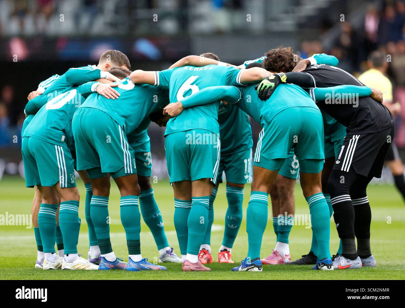 Liverpool players huddle ahead of the Premier League match at Turf Moor ...