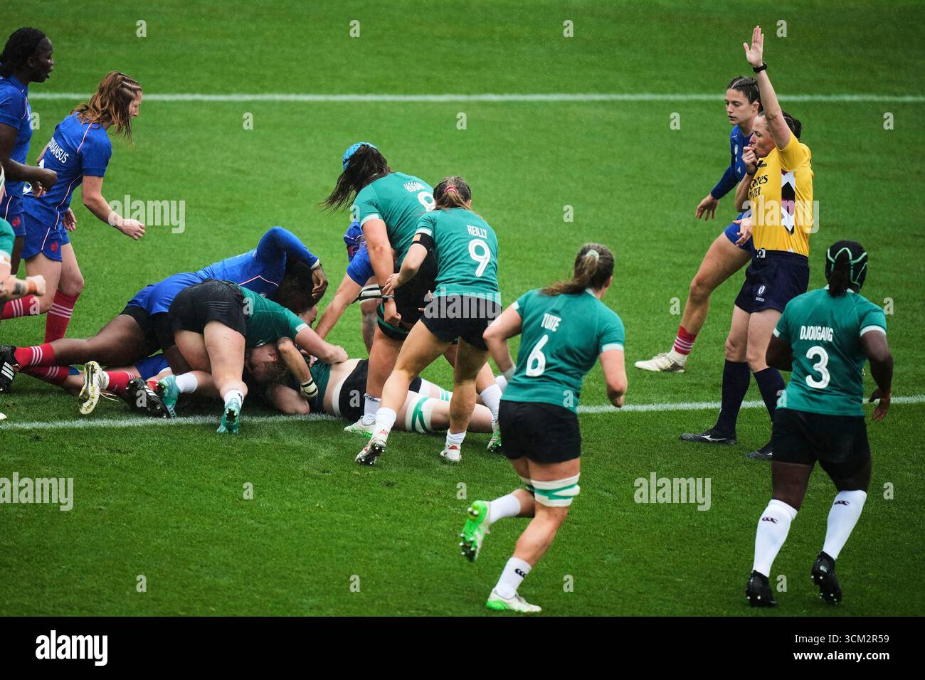 Ireland's captain Sam Monaghan, bottom, scores a try during a Women's ...