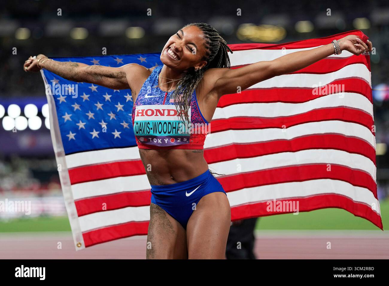 United States' Tara Davis-Woodhall reacts after winning the gold medal ...