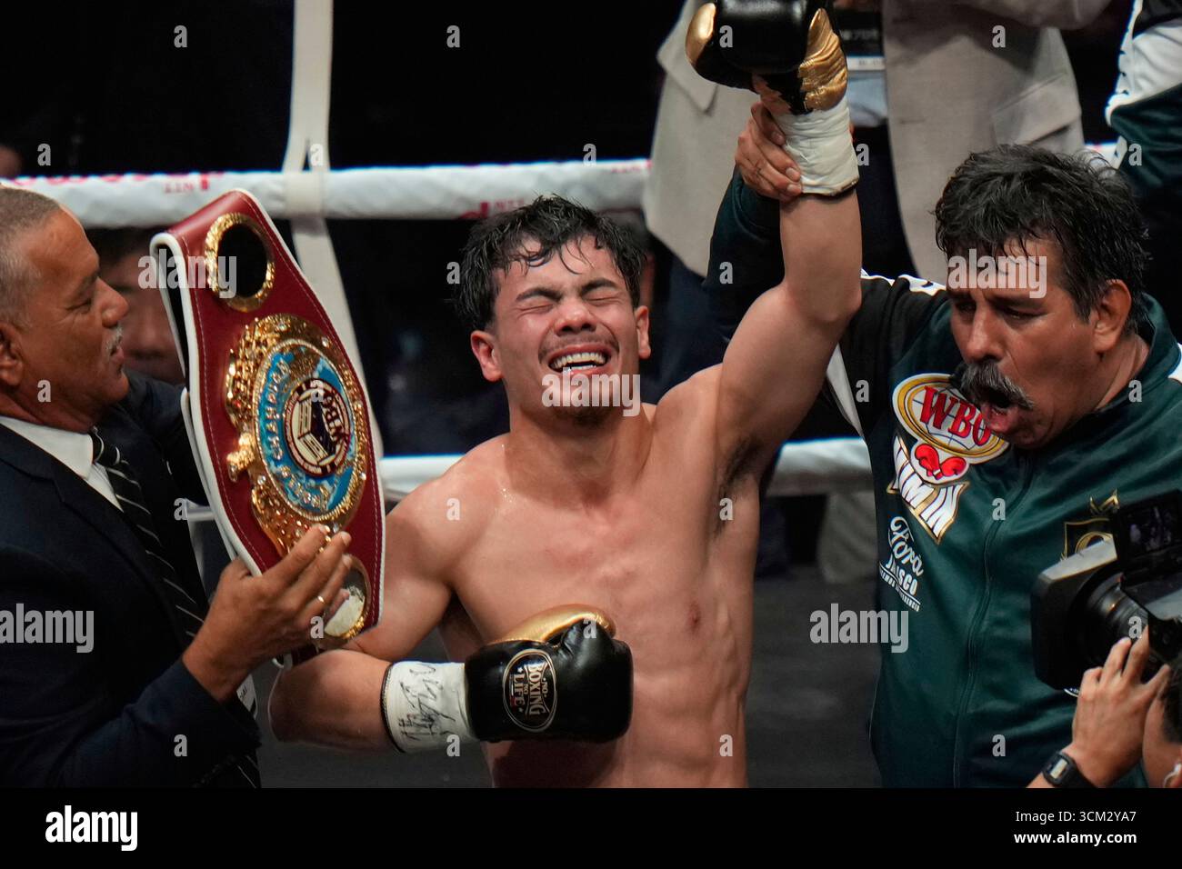 Christian Medina, center, of Mexico celebrates after defeating Yoshiki ...