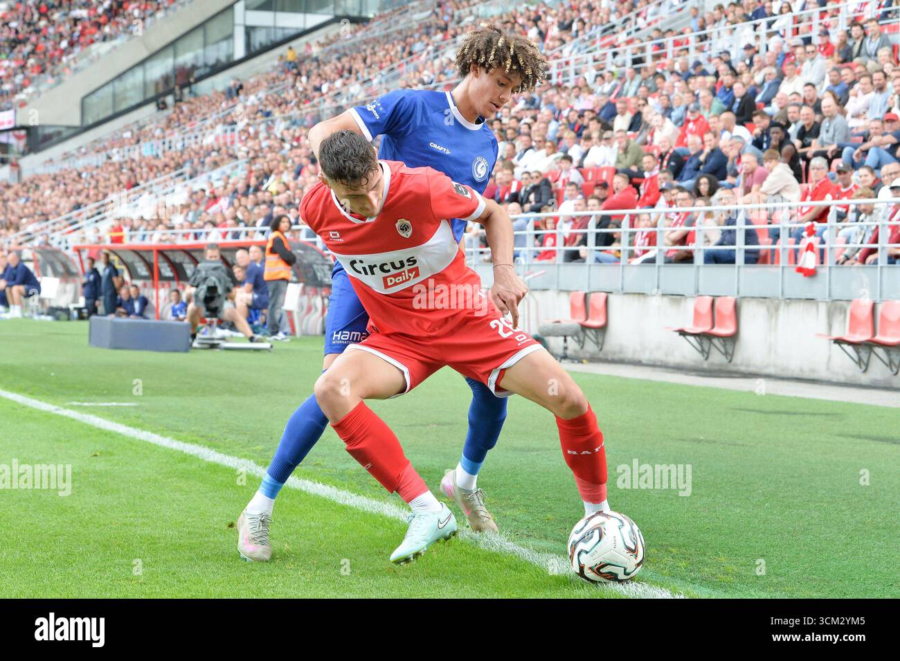 Antwerp's Rosen Bozhinov and Gent's Franck Surdez pictured in action ...