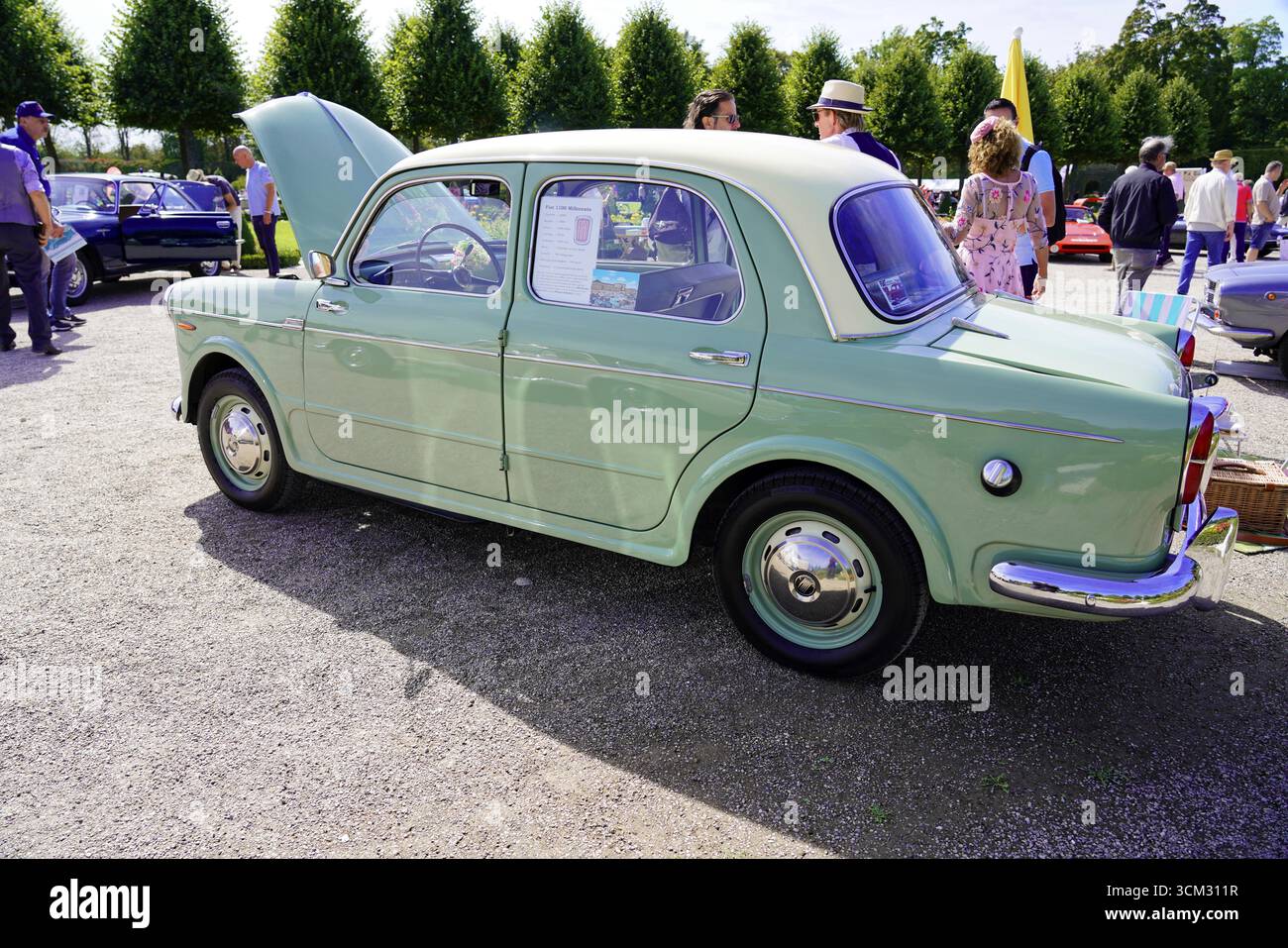 Fiat 1100 Millecento, built in 1958, green classic car from the side ...
