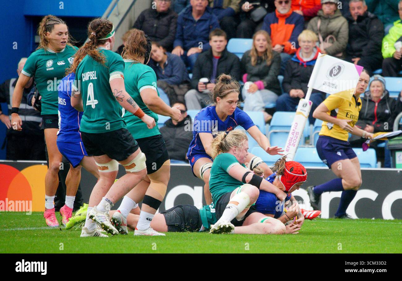 France's Charlotte Escudero scores a try during the Women's Rugby World ...