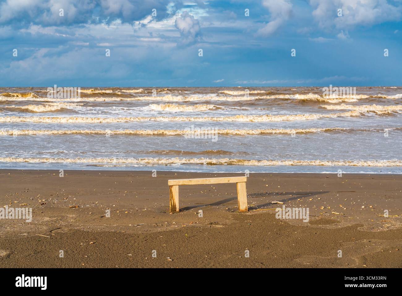 Lonely bench on shore hi-res stock photography and images - Alamy