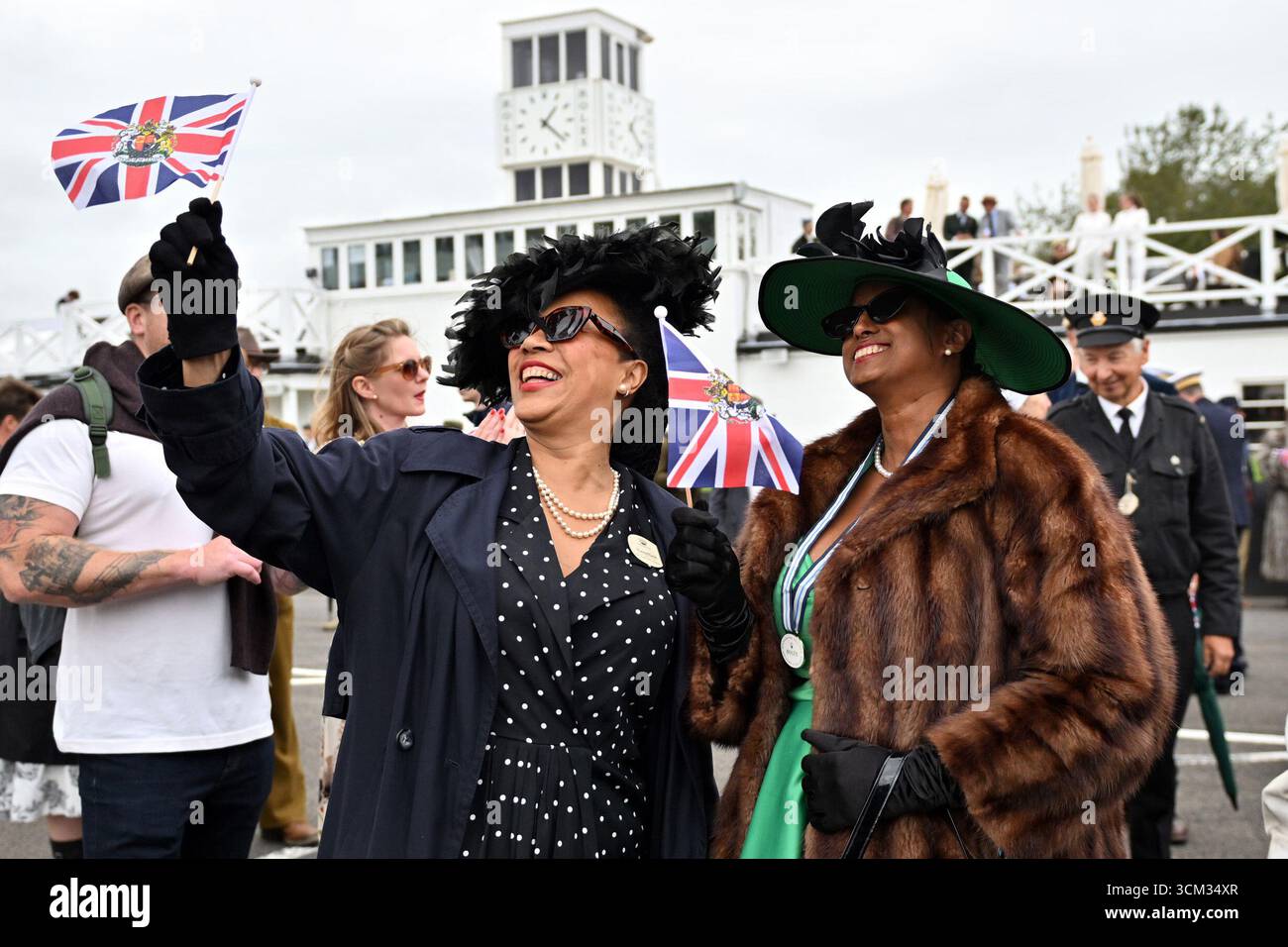 Racemeet goers take part in a VE Day 80th-anniversary street party on ...