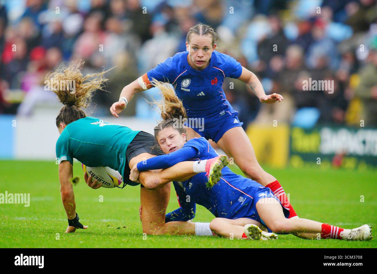 Ireland's Beibhinn Parsons is tackled by France's Morgane Bourgeois ...