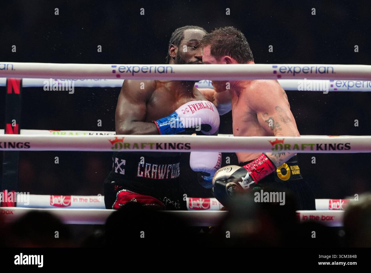 LAS VEGAS, NV - SEPT 13: (R-L) Terence Crawford punches Canelo Alvarez ...