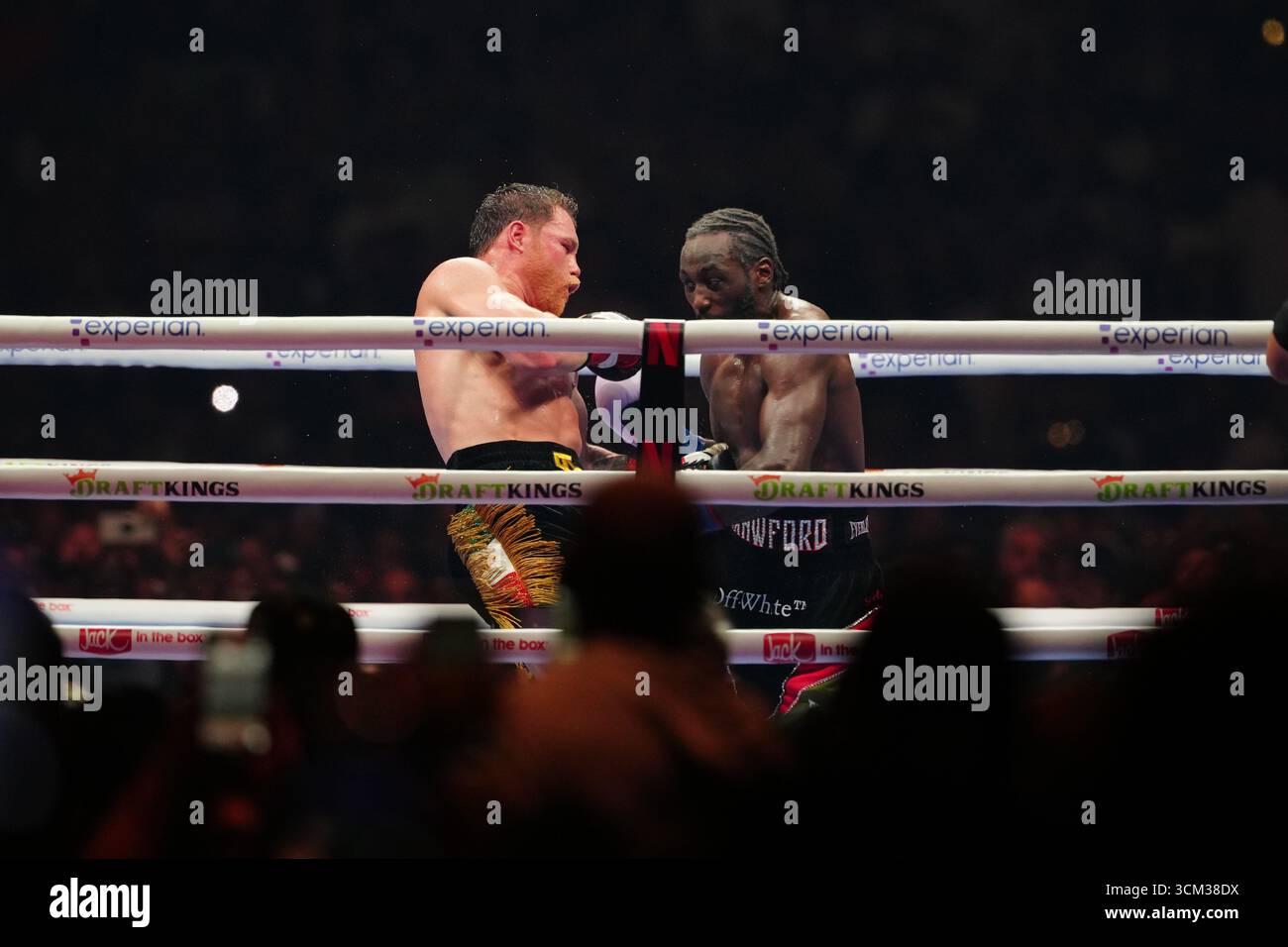 LAS VEGAS, NV - SEPT 13: (L-R) Canelo Alvarez punches Terence Crawford ...