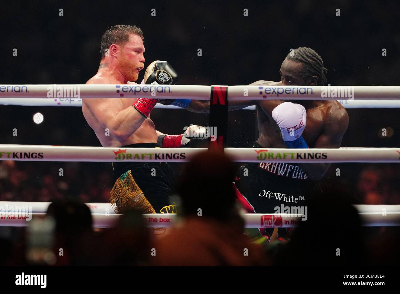 LAS VEGAS, NV - SEPT 13: (R-L) Terence Crawford punches Canelo Alvarez ...