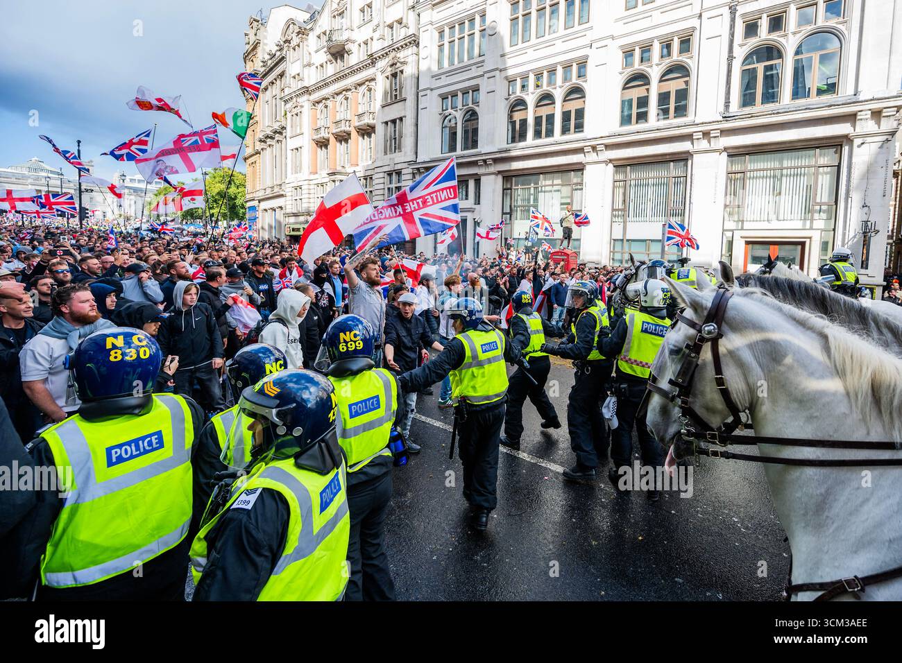 London, UK. 13th Sep, 2025. After bottle throwing the police eventually ...